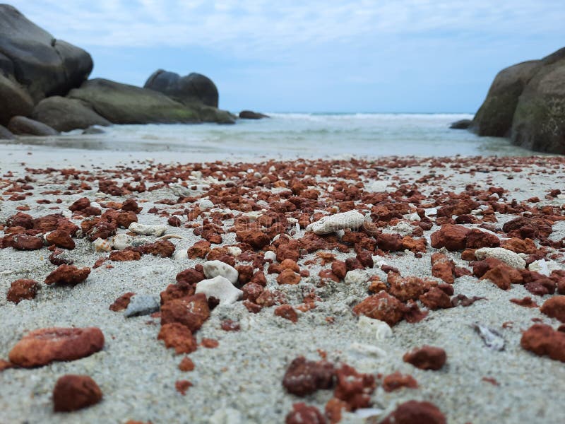 Rocks Arranged on a Stretch of Beach Sand Stock Photo - Image of ...