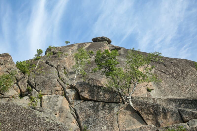 Rocks on a Background of the Sky in Spring. Stock Image - Image of ...