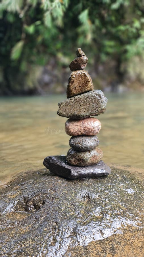 Stack of Balanced Stones in River Stock Photo - Image of scenic, river ...