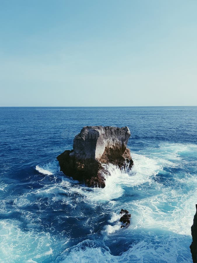 Rocks in Bali stock photo. Image of wave, terrain, shore - 218970516