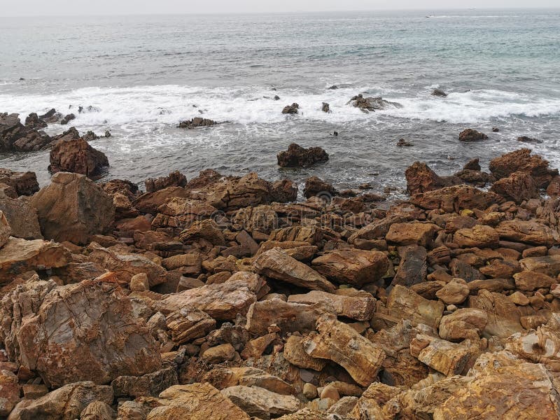 Rocks in beach stock image. Image of water, beach, stone - 172498961