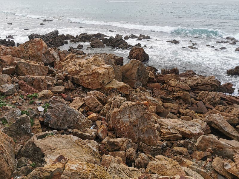 Rocks in beach stock image. Image of stone, water, ocean - 172498981
