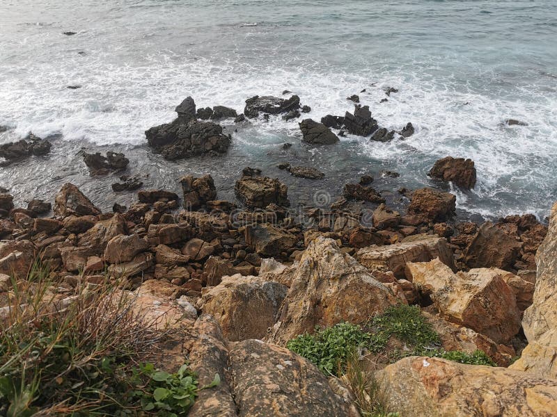 Rocks in beach stock photo. Image of waves, water, beach - 172499226