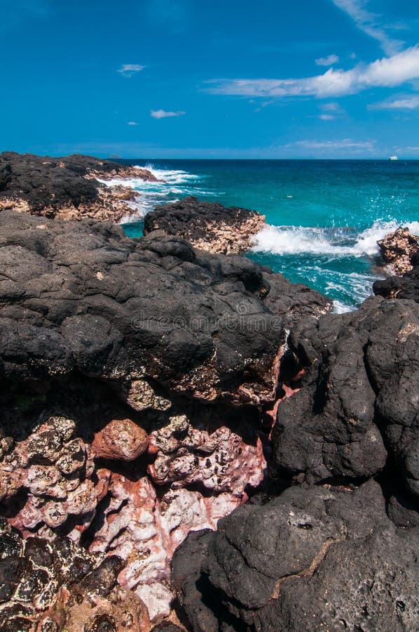 Rocks on the beach stock photo. Image of coast, padangbai - 27796256