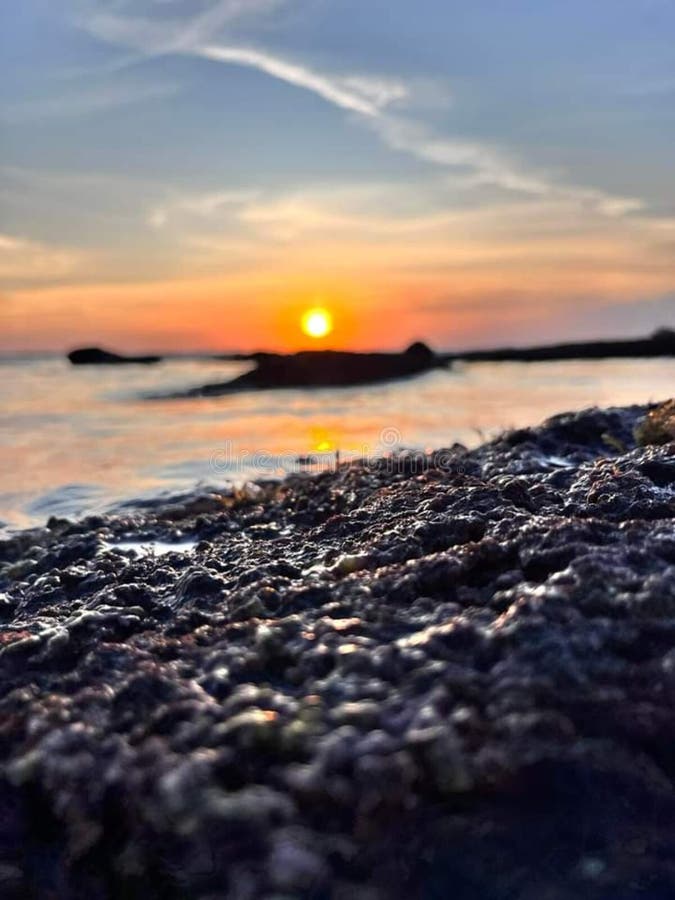 Rocks on the Beach with Beautiful Sunset Stock Image - Image of sand ...