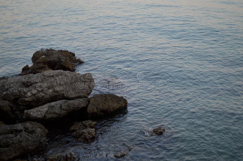 Rocks at the Beach, Calm Water Stock Image - Image of ocean, nature ...