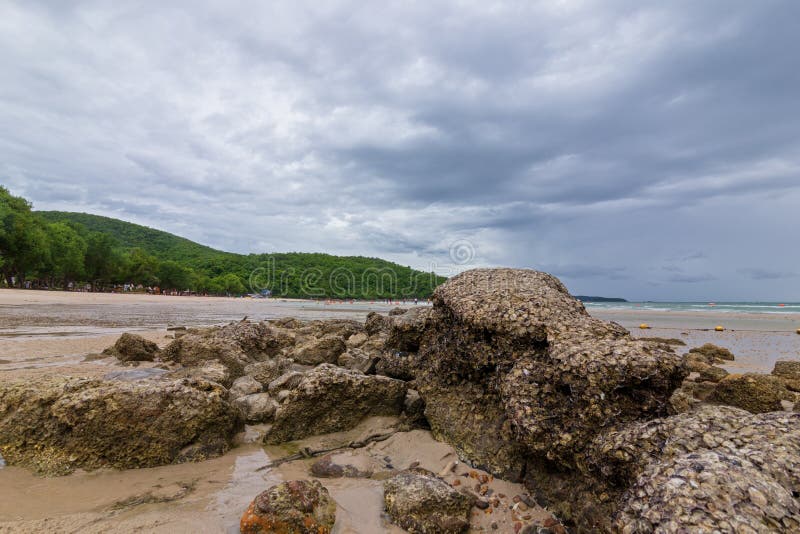 The Rocks on the Beach with Rain Cloud at Island Stock Photo - Image of ...