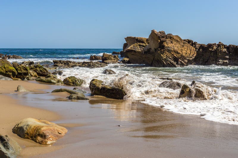 Rocks at the Beach stock image. Image of green, family - 64788823