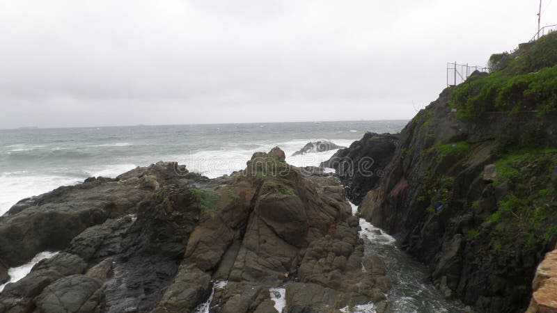 Rocks on the beach stock image. Image of splash, landscape - 94535557