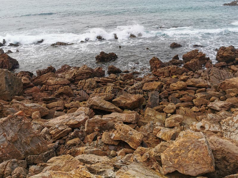 Rocks in beach stock image. Image of ocean, stone, rocks - 172498923
