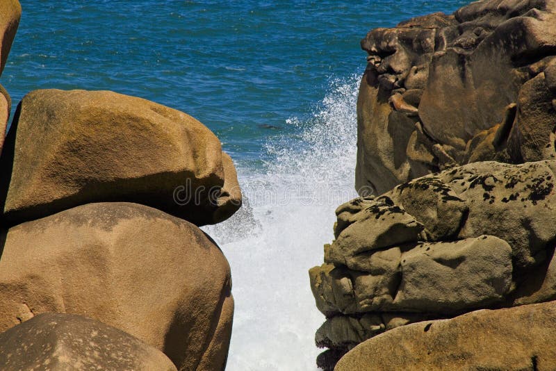Rocks on the beach stock image. Image of wave, coast - 205622075