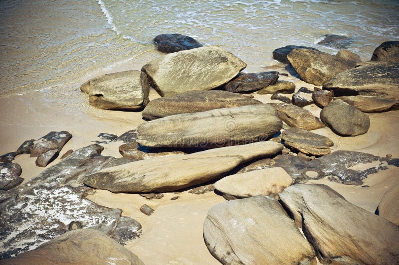 Rocks on beach stock image. Image of ocean, selection - 55326365