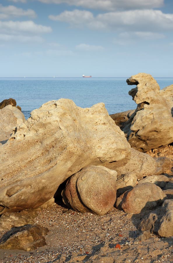 Rocks on beach stock image. Image of ocean, landscape - 32176495