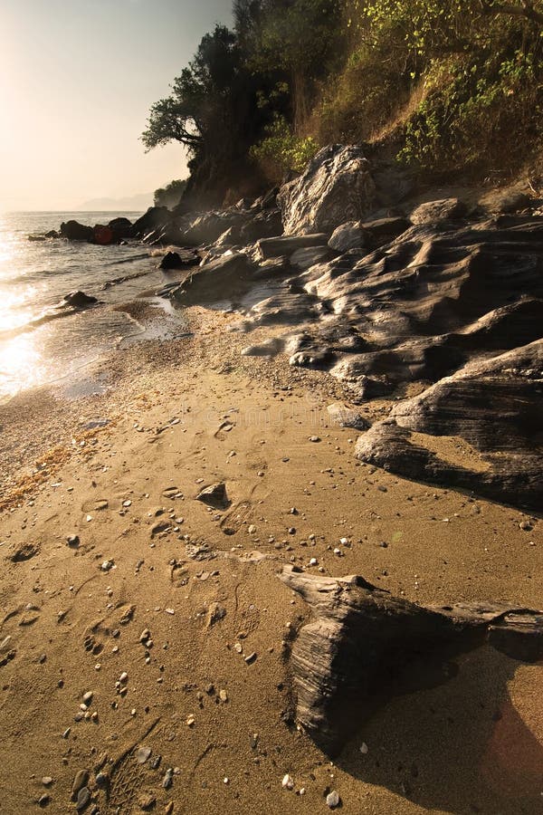 Rocks on a Beach Shore stock image. Image of idyllic - 14706277