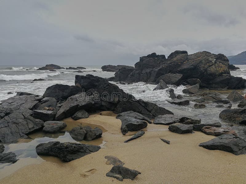 Rocks on the Beach after the Storm Stock Image - Image of landmarks ...