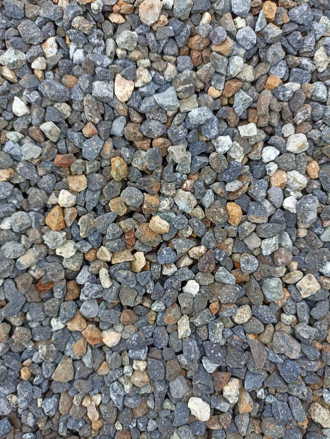 Rocks that is Broken Down by a Crushing Machine into Small Pebbles ...