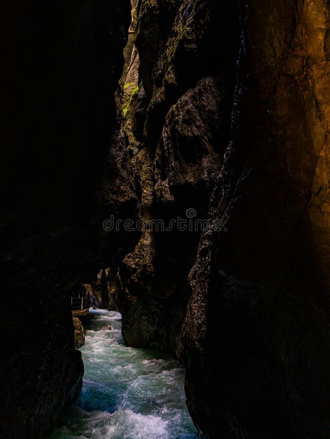 A Mountain River of Emerald Color Flows through a Narrow Gorge. Stock ...