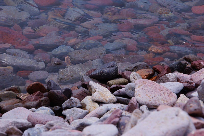 Rocks through clear water stock photo. Image of water - 90964570