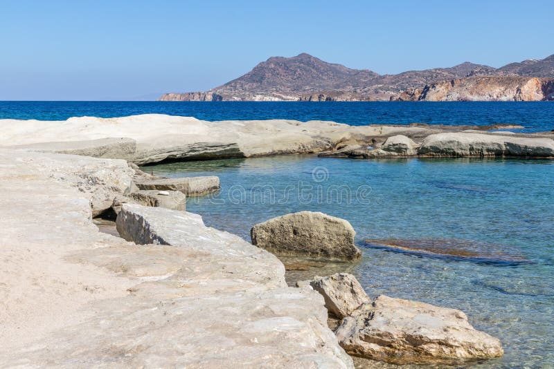 Rocks and Cliffs in Pollonia Beach Stock Image - Image of mountain ...