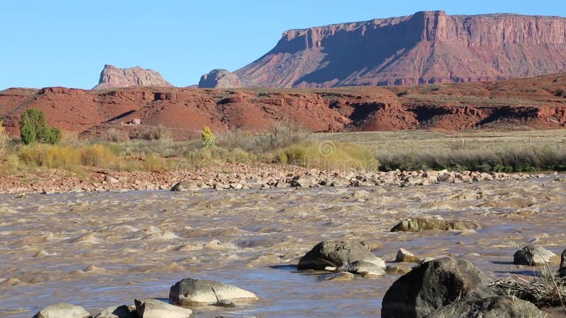 Colorado River Valley in Canyon with Red Rock Butte Massive Aerial View ...