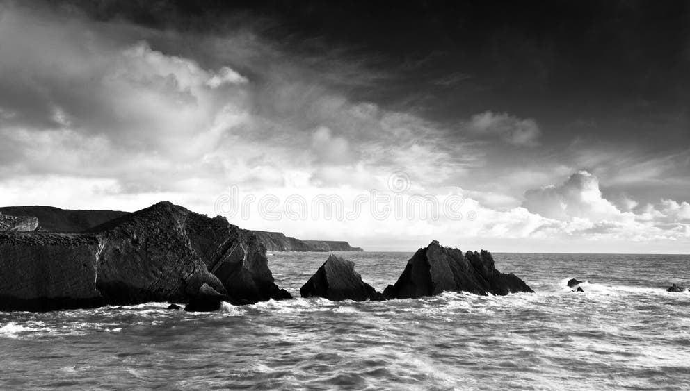 Rocks in Cornwall stock photo. Image of waves, tides - 19668982