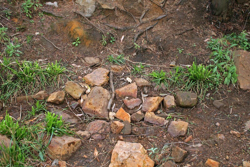 ROCKS IN A DITCH ON A HIKING TRAIL Stock Image - Image of hiking, green ...