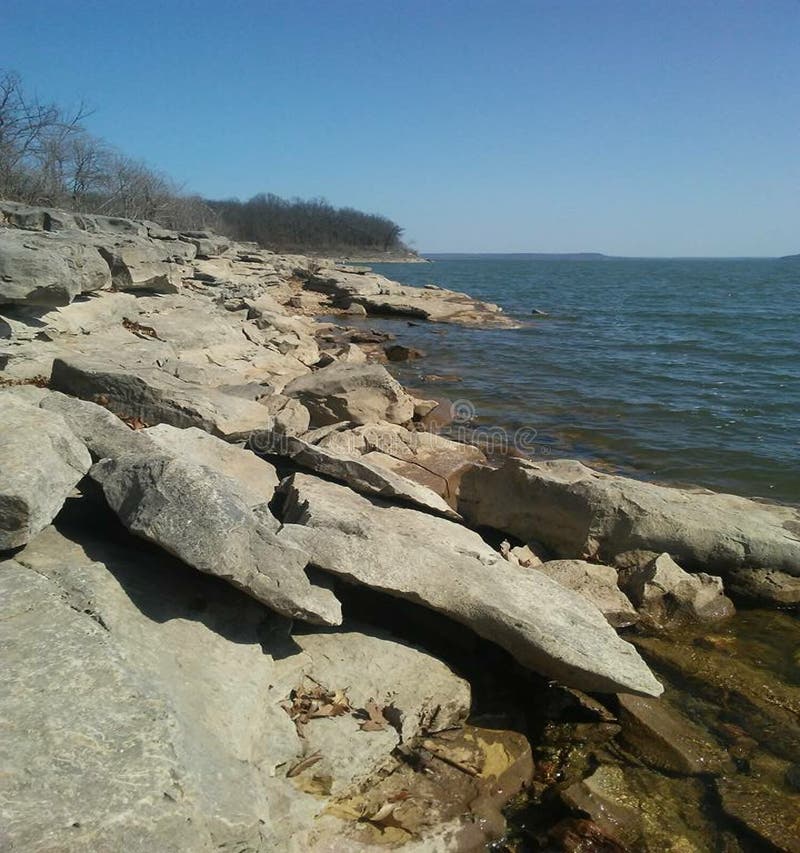 Rocks on the Edge of the Lake Stock Image - Image of lake, edge: 145720049