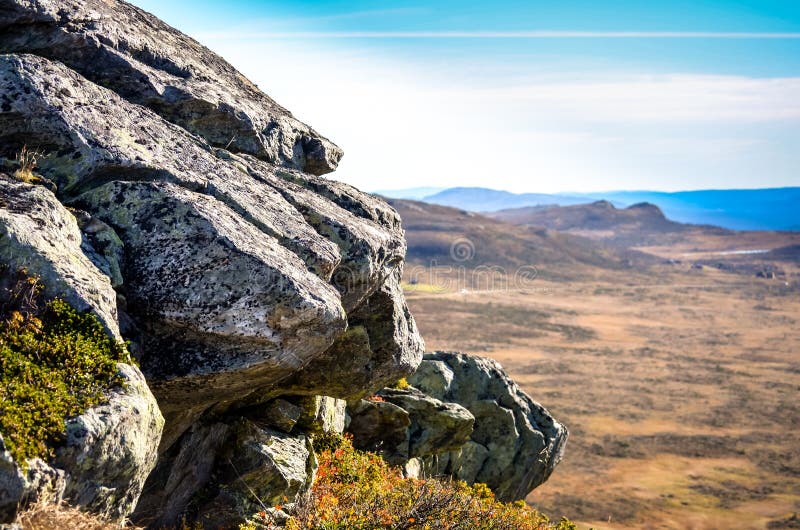 Rocks at the Edge of a Mountain with Open Range Stock Photo - Image of ...