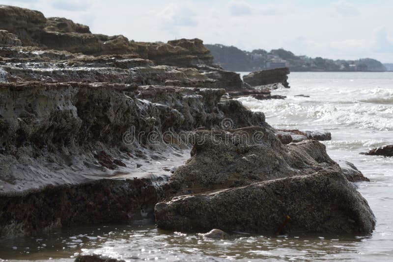 Rocks eroded by the sea stock photo. Image of travel - 72051534