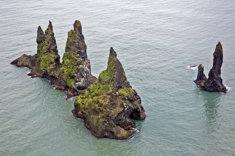 The Troll Rocks in Vik, Iceland Stock Photo - Image of misty, pura ...