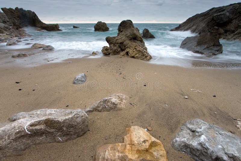 Rocks Getting Dark in the Beach of Miengo Stock Photo - Image of sailor ...