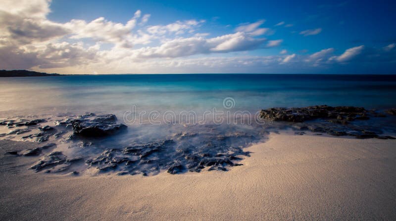 Rocks on grace bay beach stock image. Image of grace - 90074099