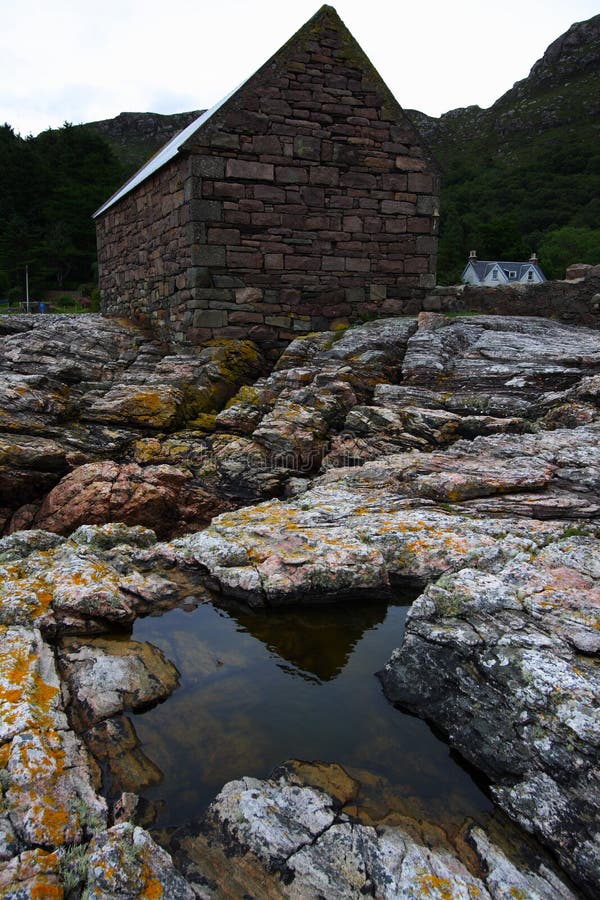 Rocks and home in scotland stock image. Image of nature - 8288861