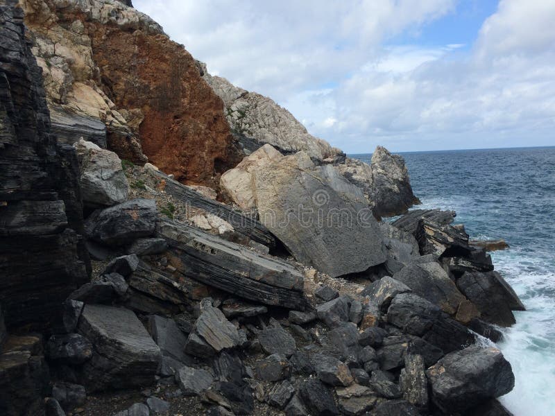 Rocks in Italian sea stock image. Image of bedrock, ocean - 78571731