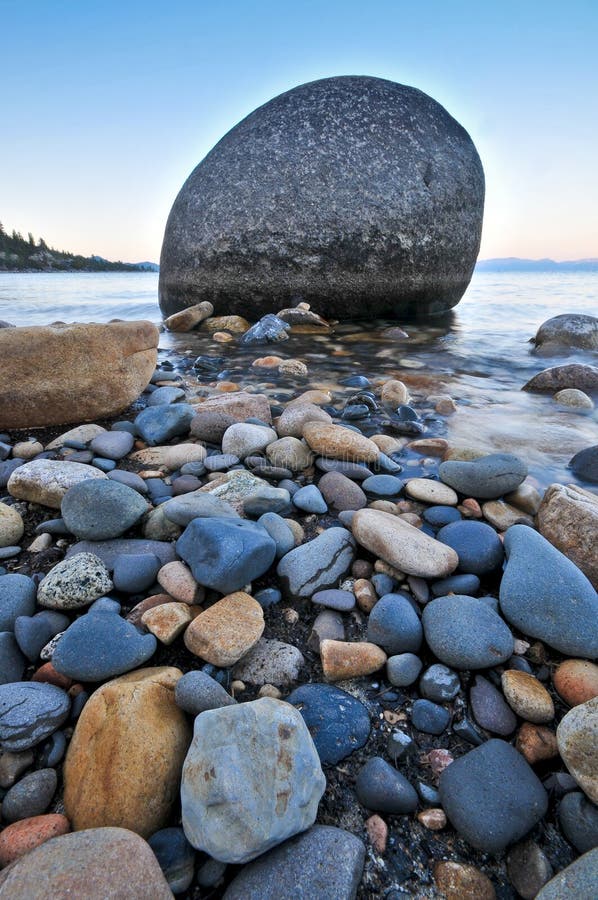 Rocks by a lake stock photo. Image of coast, bedrock - 10706326