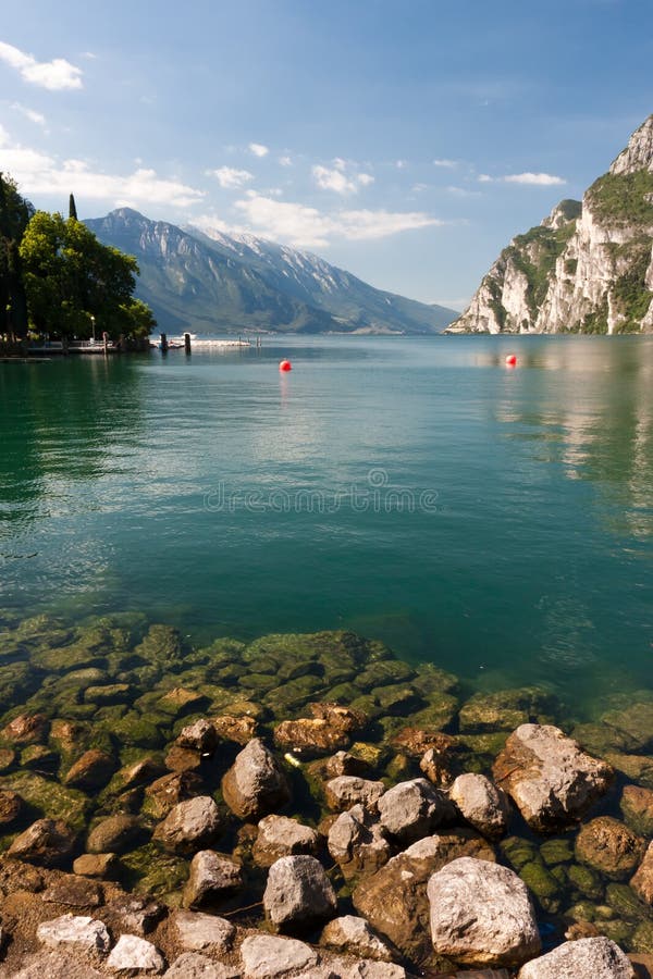 On the rocks by the lake stock image. Image of peace - 20226579