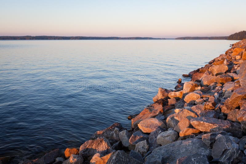 Rocks in Lake Shore at Sunset Stock Photo - Image of landscape, evening ...