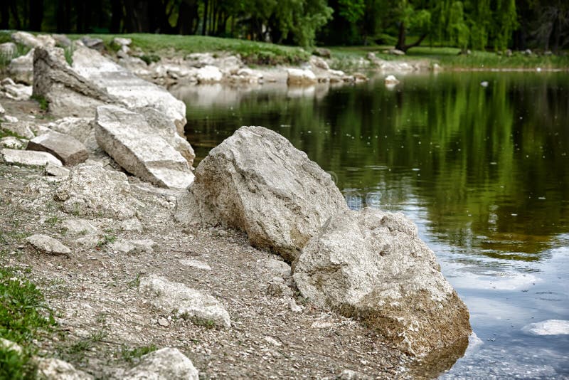 Rocks on the lake side stock photo. Image of north, scene - 70499680