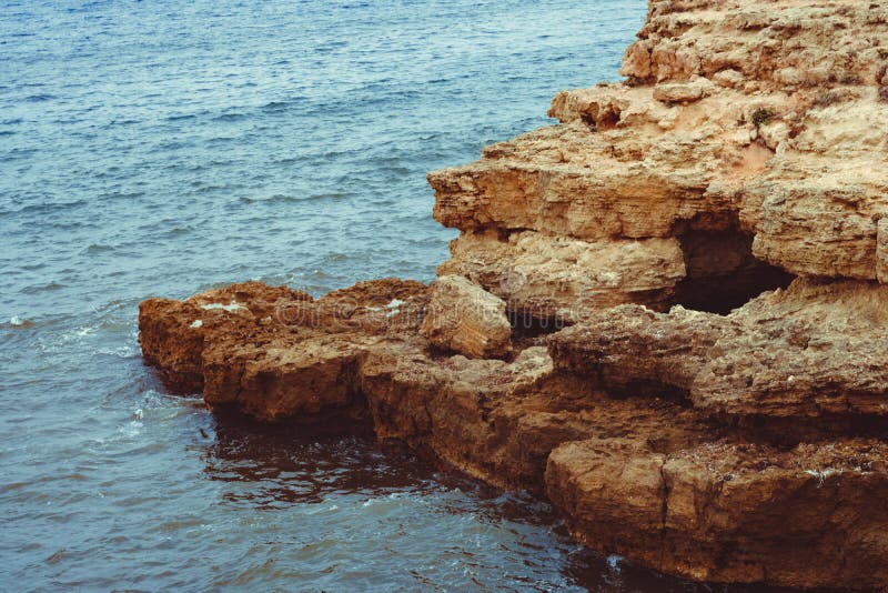 Rocks ledges by the sea stock image. Image of landscape - 220063557