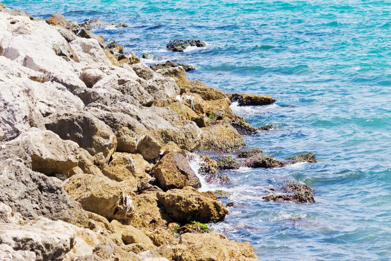 Rocks in Mediterranean Sea stock photo. Image of water - 29139848