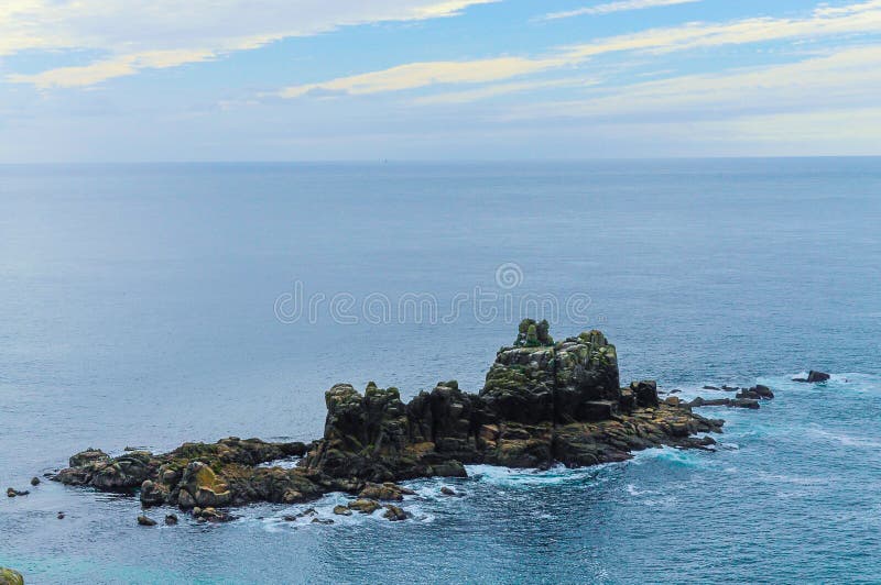 Rocks in the Middle of the Sea. Stock Photo - Image of blue ...