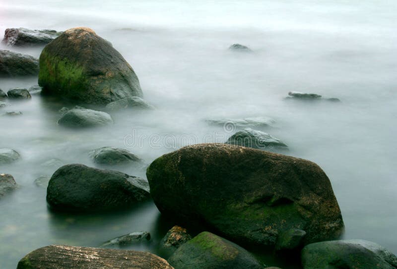 Rocks in Mist stock photo. Image of stones, coast, still - 4428654
