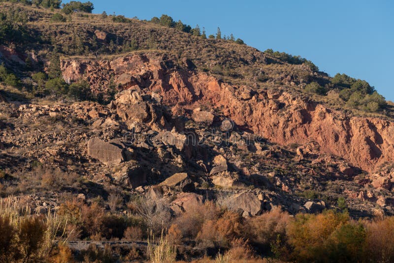 Rocks on a mountainside stock photo. Image of stone - 245230916
