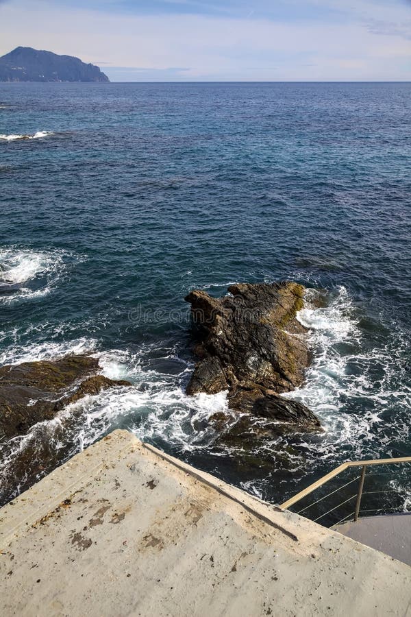 Rocks Next To a Cliff by the Sea on a Sunny Day Stock Image - Image of ...