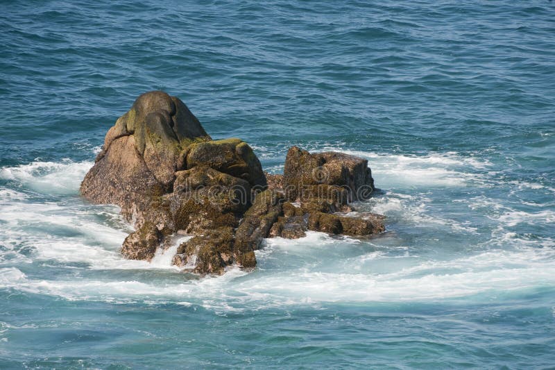 Rocks in ocean stock photo. Image of view, spray, water - 10889354