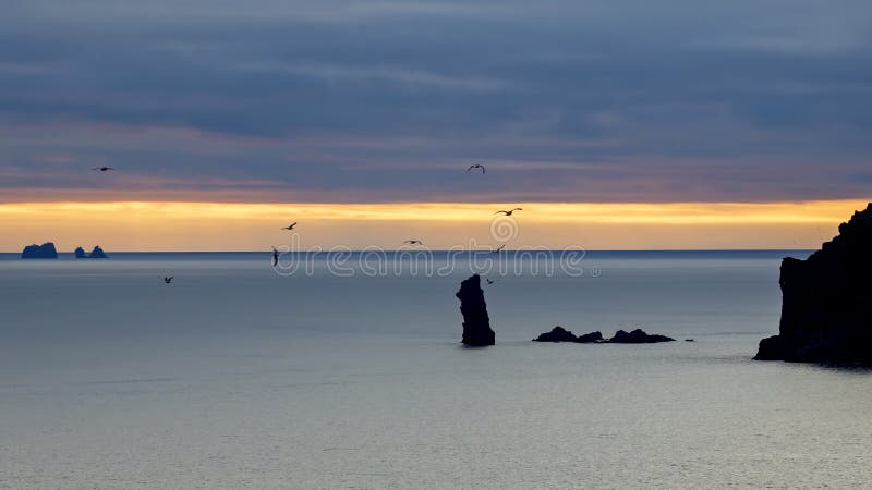 Rocks in the Ocean Against the Evening Sky Stock Photo - Image of rock ...