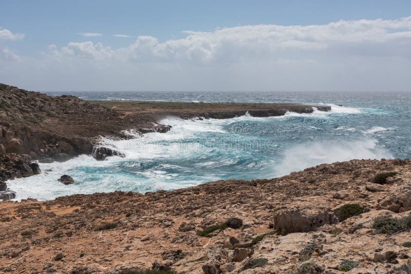 Ocean with Blue Water during a Storm, Big Waves Hitting the Rocks on ...