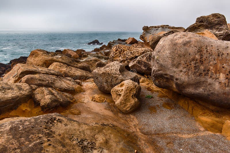 Rocks and Ocean stock image. Image of sunrise, rocks - 38840235
