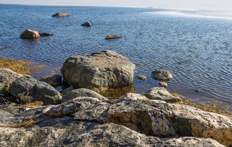 Rocks in the ocean shore stock photo. Image of shore - 39337494
