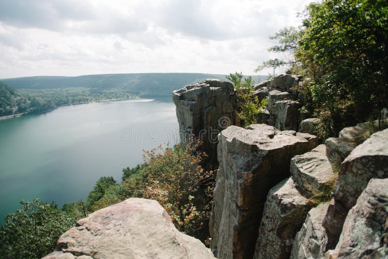 Rocks Over Looking Lake stock image. Image of devil, bolders - 60032797